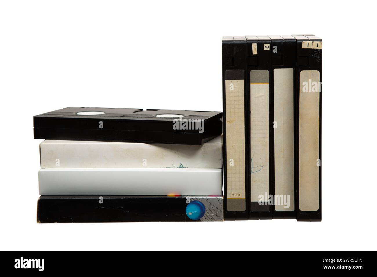 Pile of VHS video cassettes. Vintage media. Isolate on a white ...