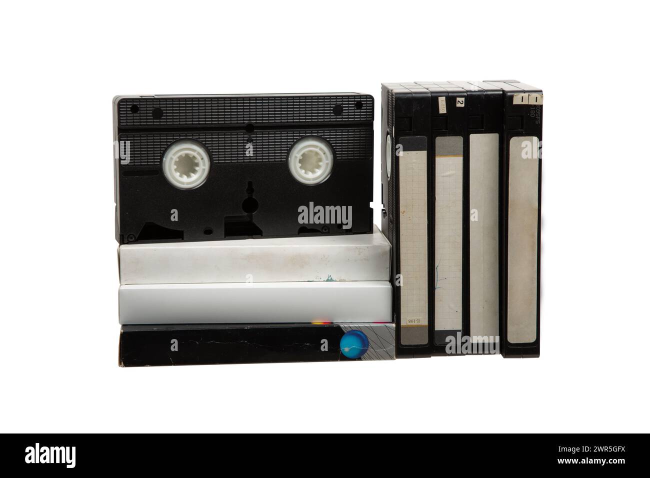 Pile of VHS video cassettes. Vintage media. Isolate on a white ...