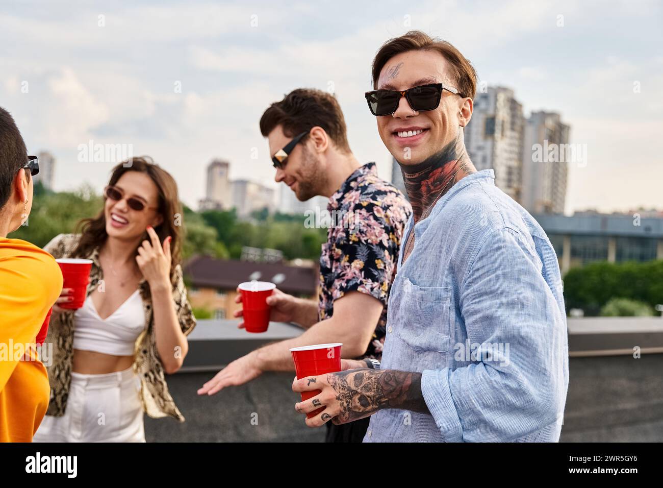 attractive jolly friends with sunglasses in casual attires having fun ...