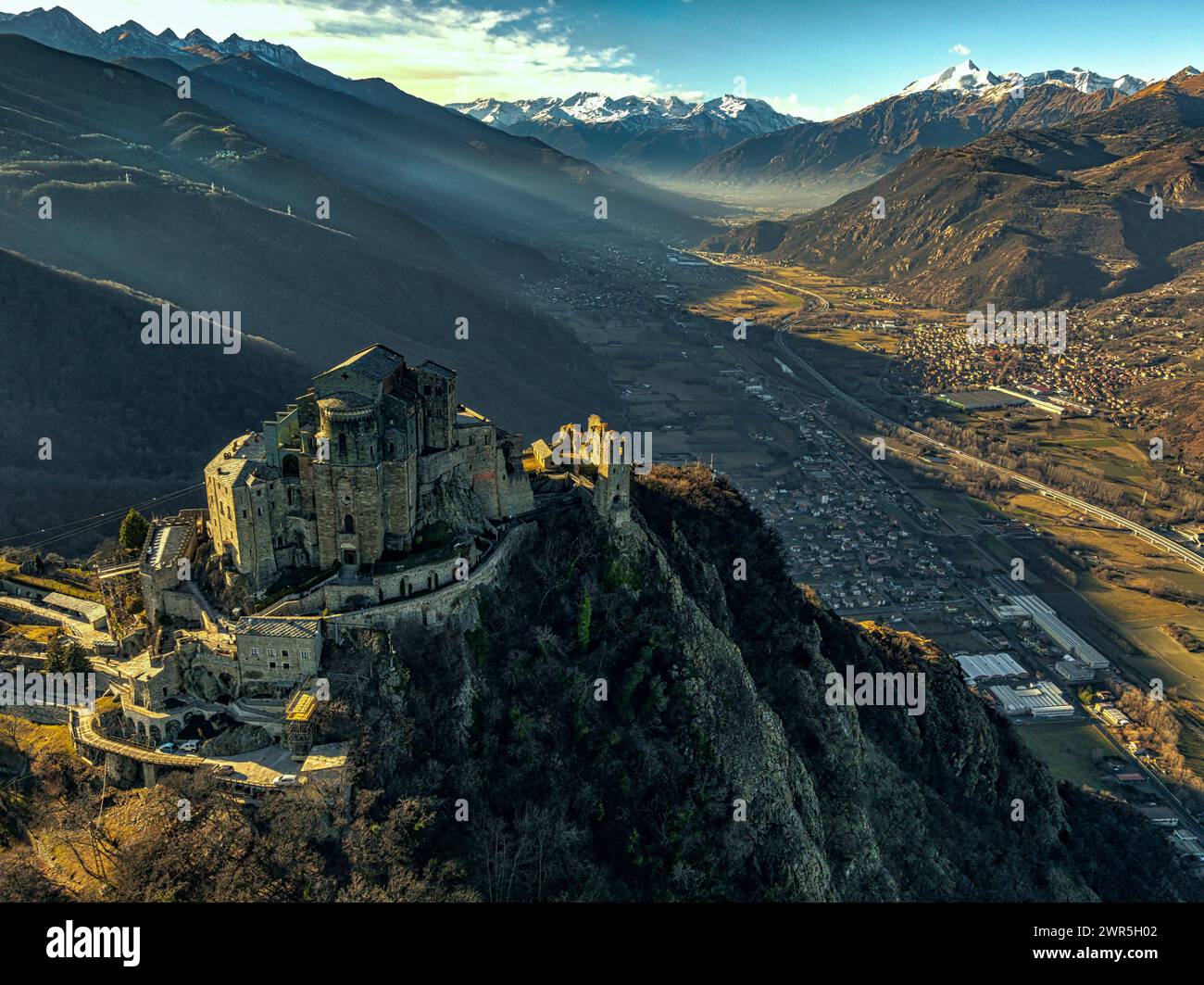 Aerial view of the Sacra di San Michele, an imposing abbey that ...