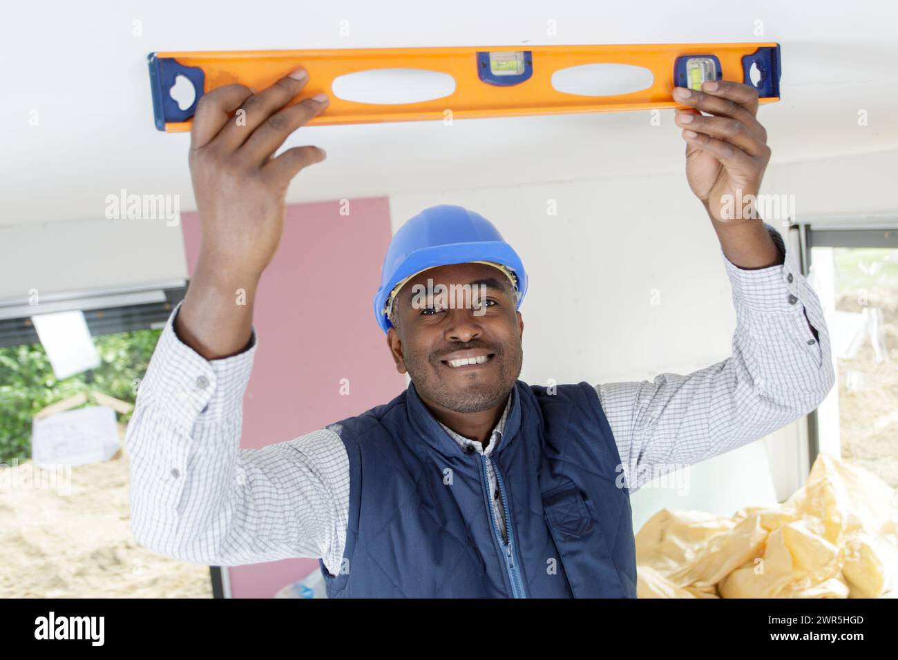 Builder man level mixed hi-res stock photography and images - Alamy
