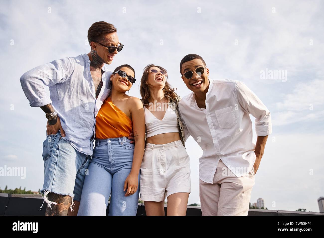 jolly diverse good looking friends with stylish sunglasses posing ...