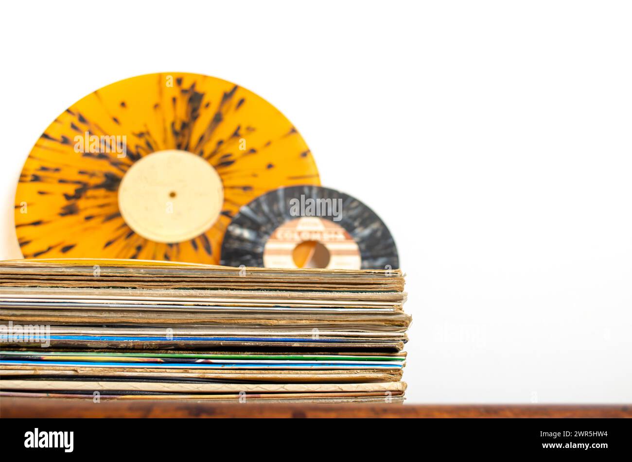 Vinyl disc lying on white wall. Retro Stock Photo - Alamy