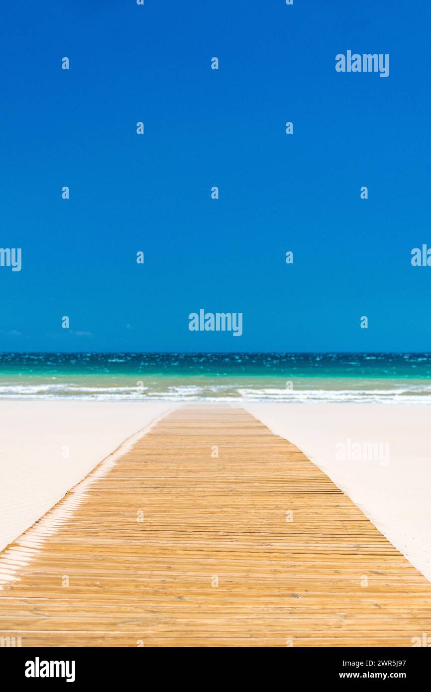 Path to Paradise: Wooden Boardwalk on Pristine Beach Stock Photo - Alamy