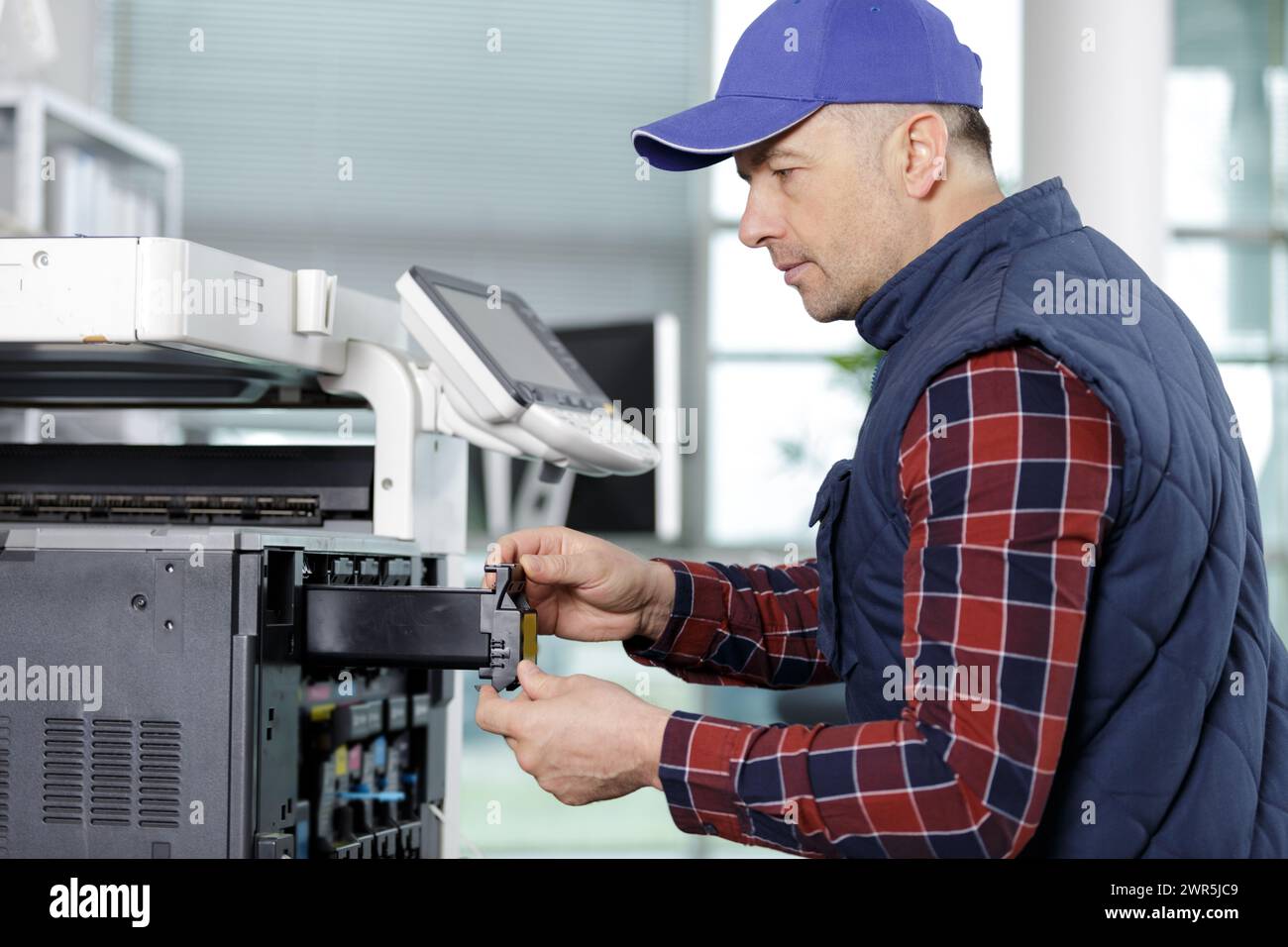 Technician man repairing photocopy hi-res stock photography and images ...