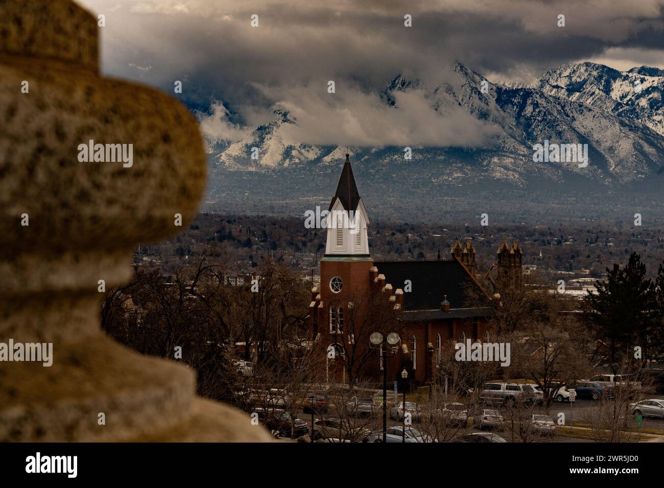 Church view from the SLC capital with the mountains Stock Photo - Alamy