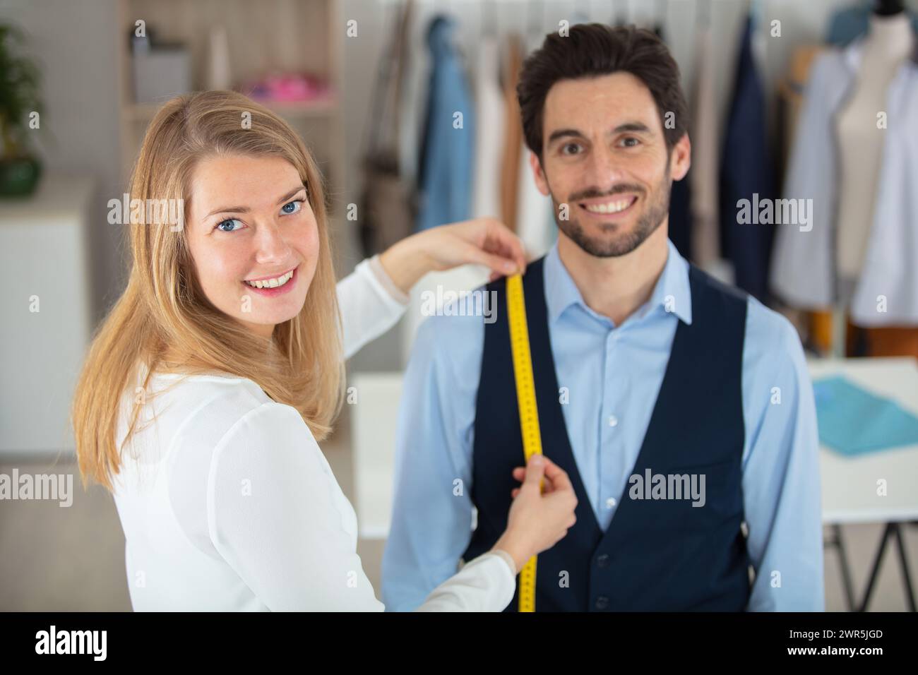 Tailor taking measurements customer hi-res stock photography and images ...
