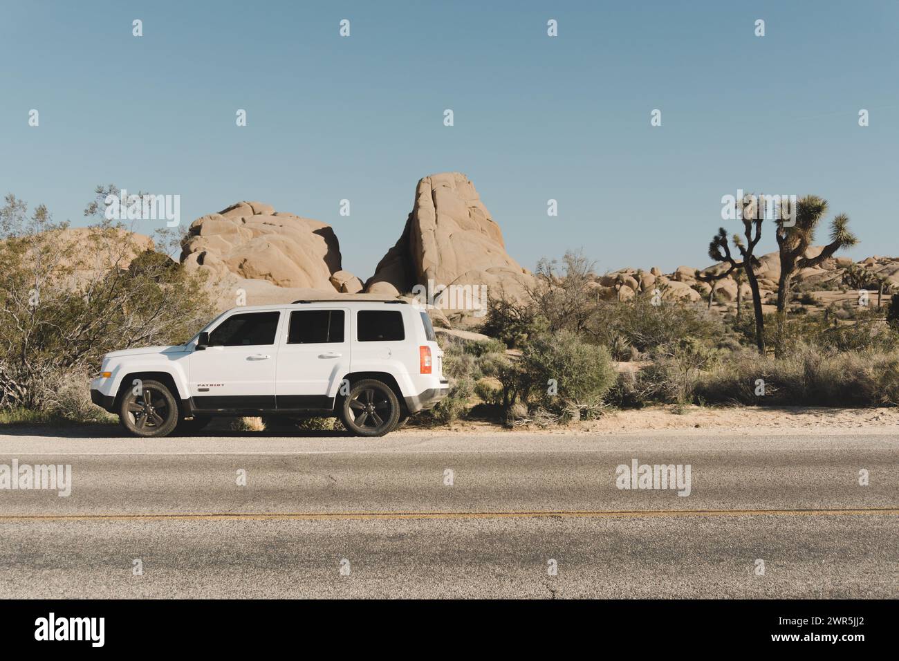 Car parked along road in Joshua Tree National Park Stock Photo - Alamy