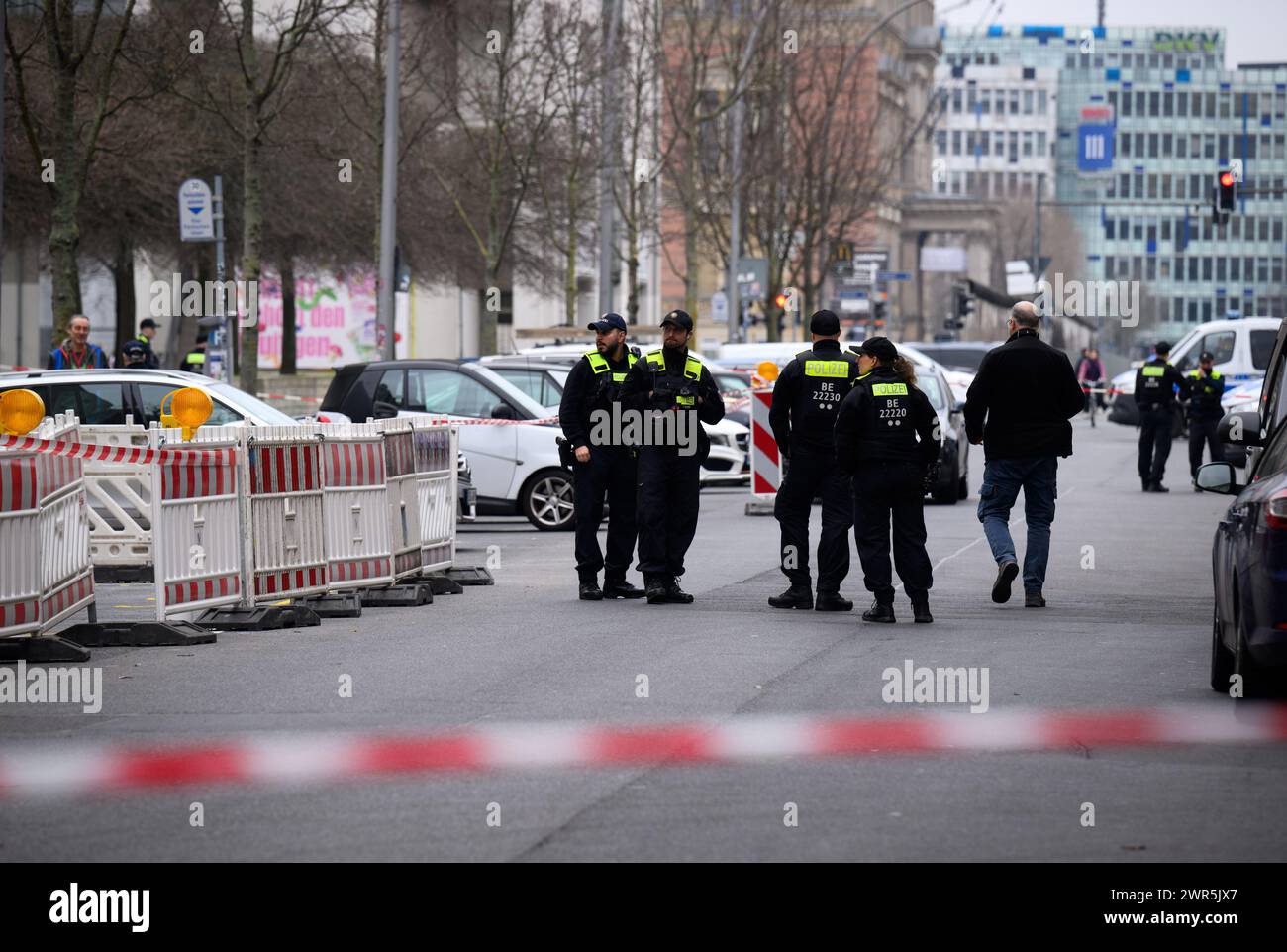 Berlin, Germany. 11th Mar, 2024. Police officers stand around the ...
