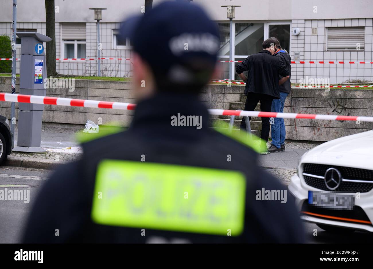 Berlin, Germany. 11th Mar, 2024. Police officers stand around the ...