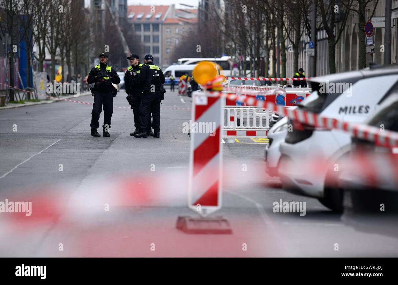 Berlin, Germany. 11th Mar, 2024. Police officers stand around the ...