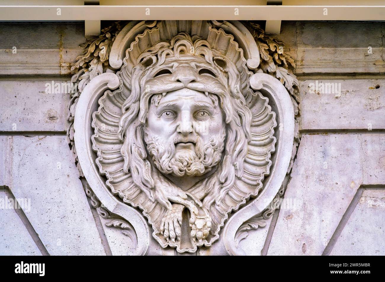 Face decoration made in stone. Architecture and architetural features ...