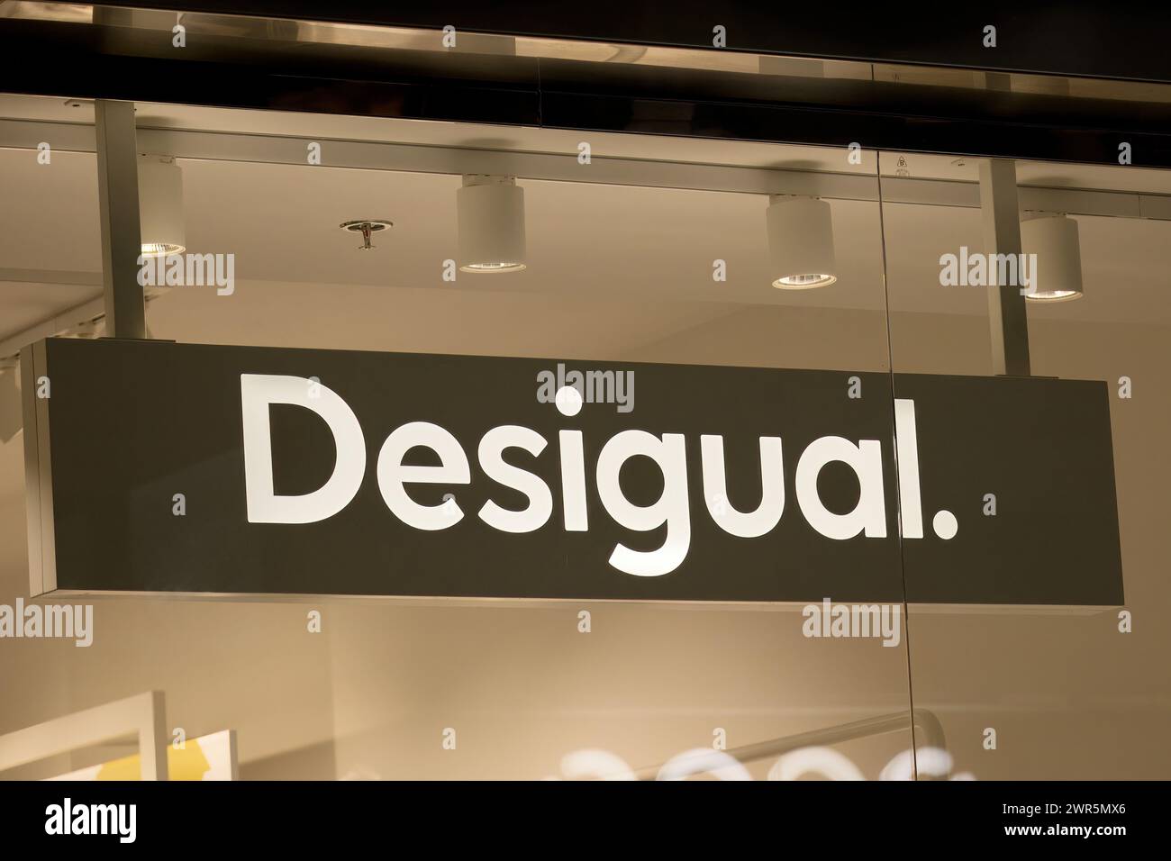 Logo of Designual on the shop at Shopping Mall. Desigual is a casual ...