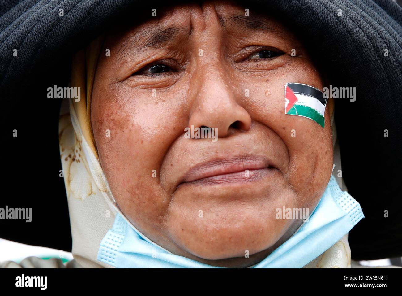 A woman protester cries during a rally organised by a civil society ...