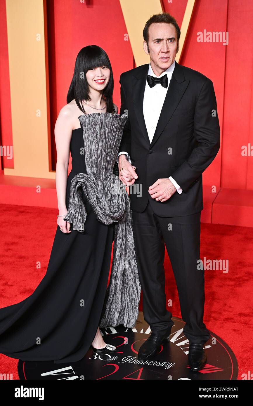 Los Angeles, USA. March 10th, 2024. Riko Shibata and Nicolas Cage ...