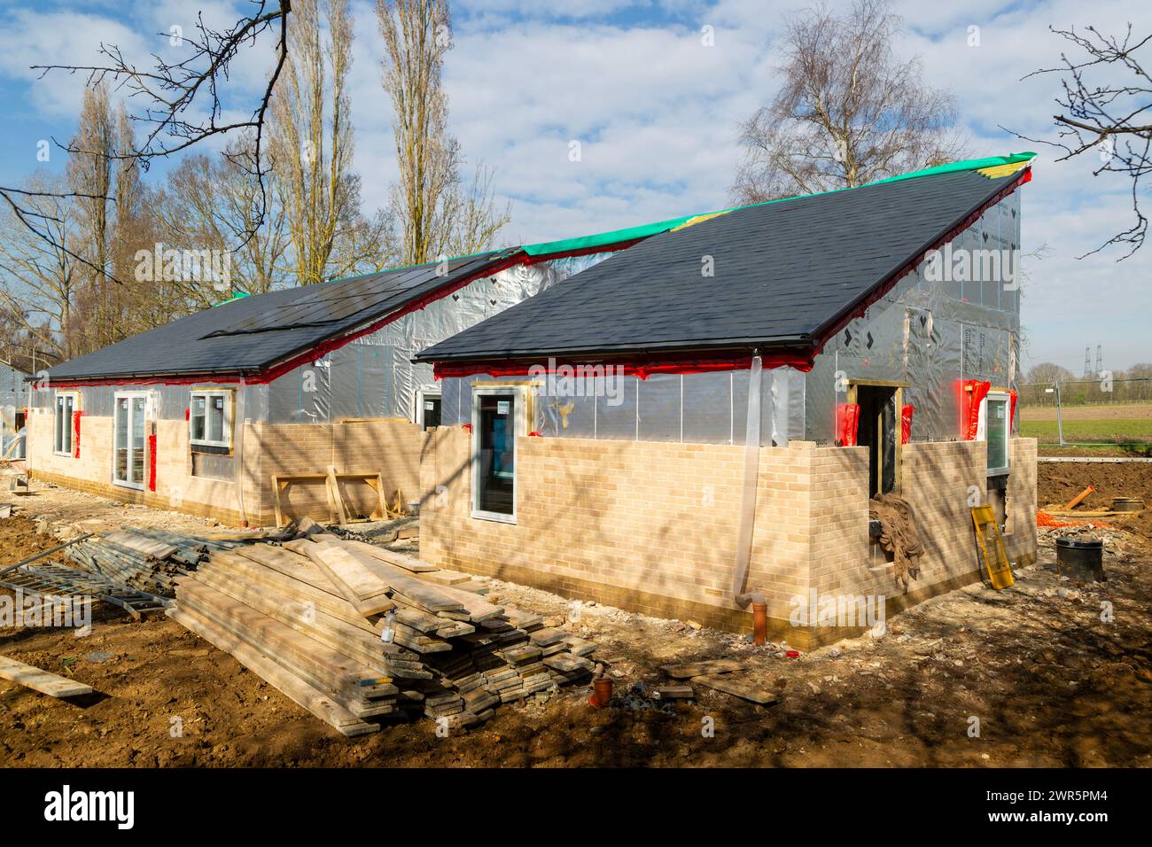 Building site construction single storey bungalow homes, timber frame ...