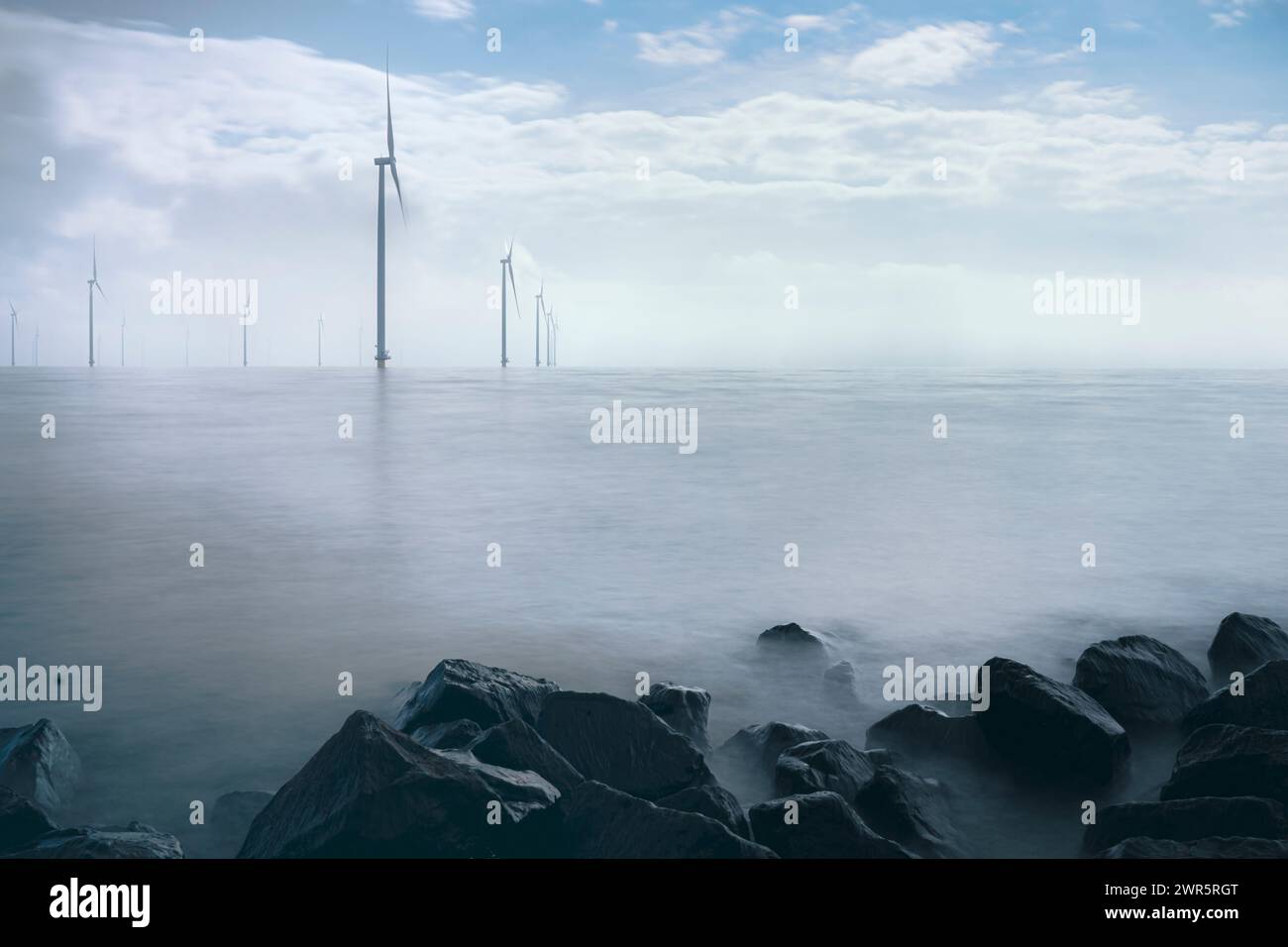 Windmill park in the ocean, aerial view of windmill turbines generating ...