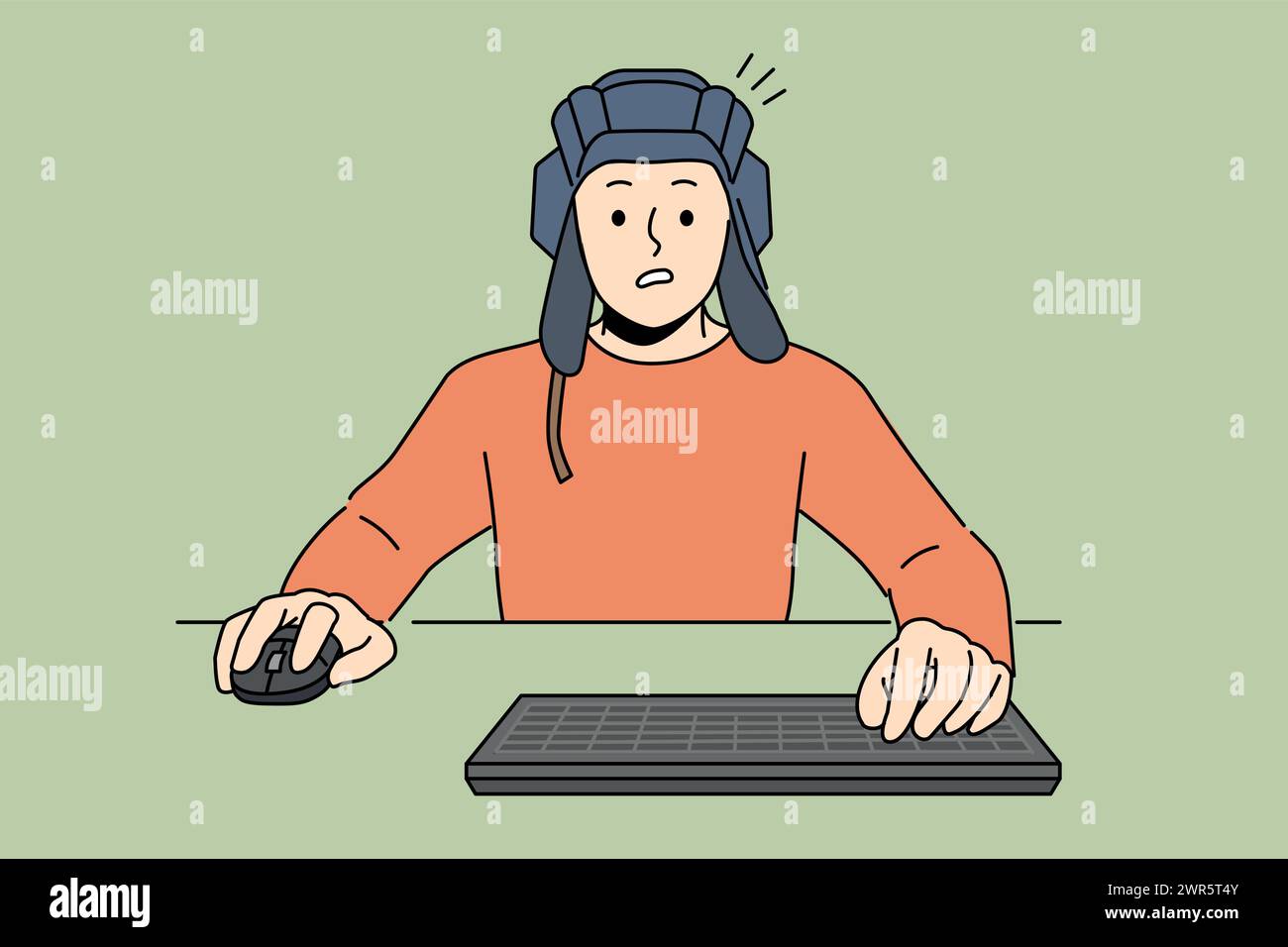 Man gamer plays tanks on computer, sitting at table with keyboard and ...