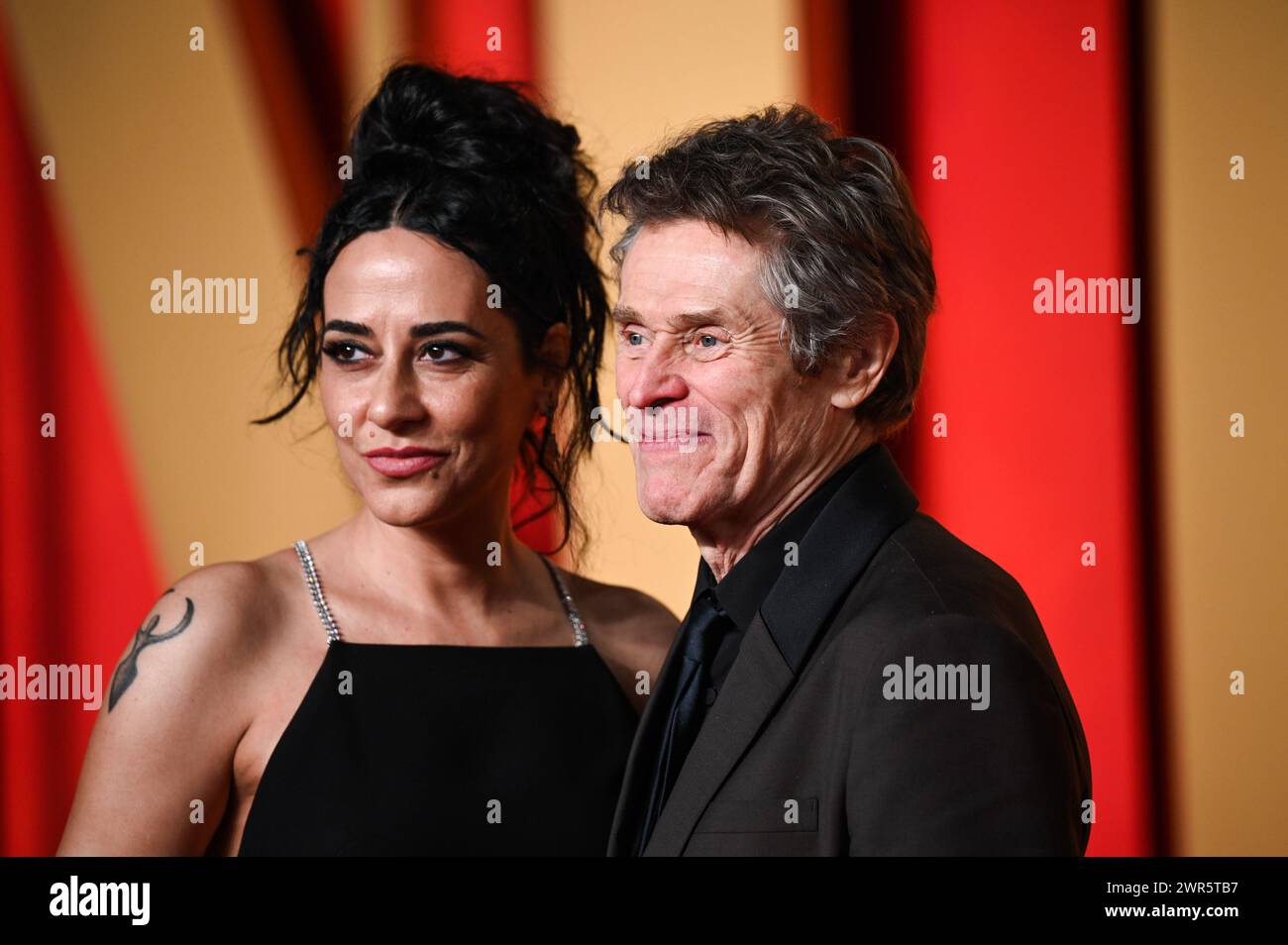USA. 10th Mar, 2024. Giada Colagrande and Willem Dafoe walking on the red carpet at the 2024 ...