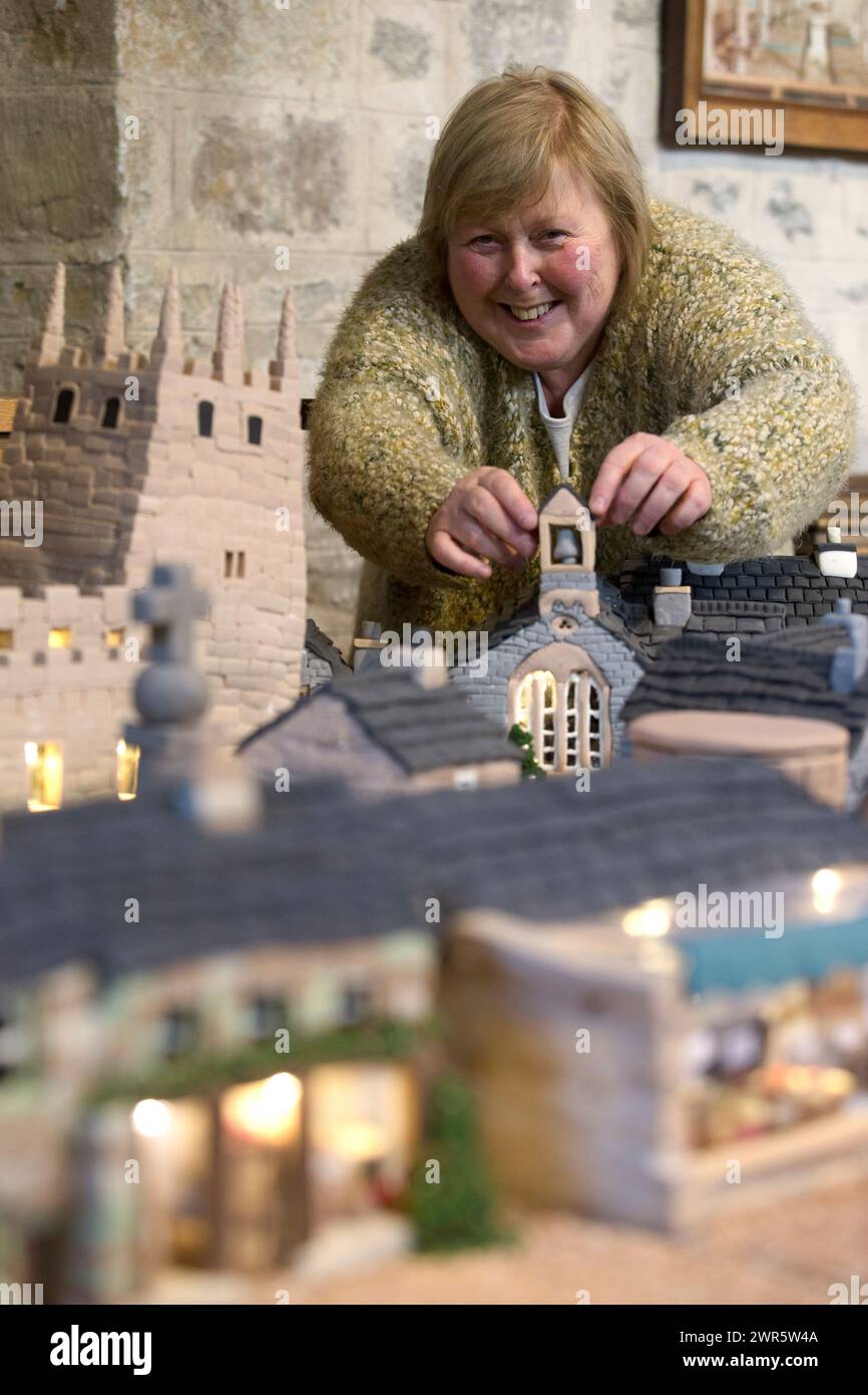 07/12/16 Lynn Nolan, 59, with her cake village. In this incredibly ...