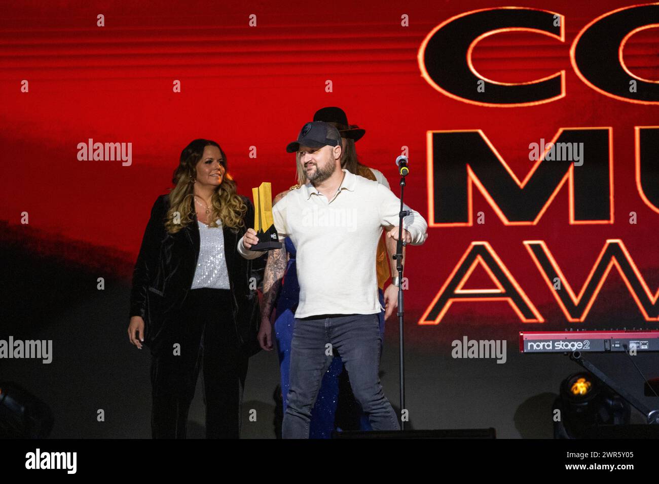 Edmonton, Canada. 10th Mar, 2024. Aaron Goodvin receives the Award for ...