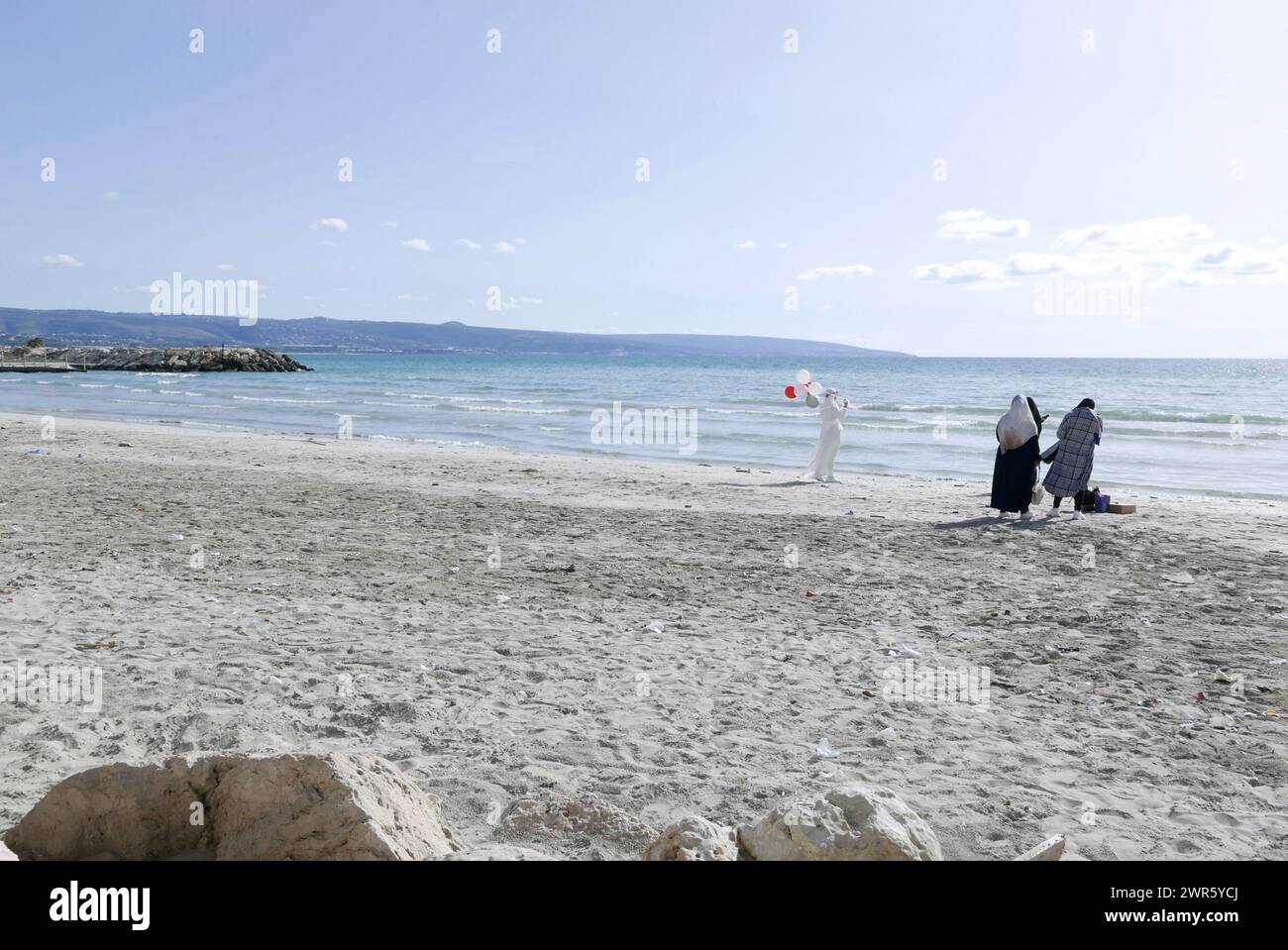 Sour Tyr Tyre, Lebanon. 10th Mar, 2024. Girls stroll on the south beach ...