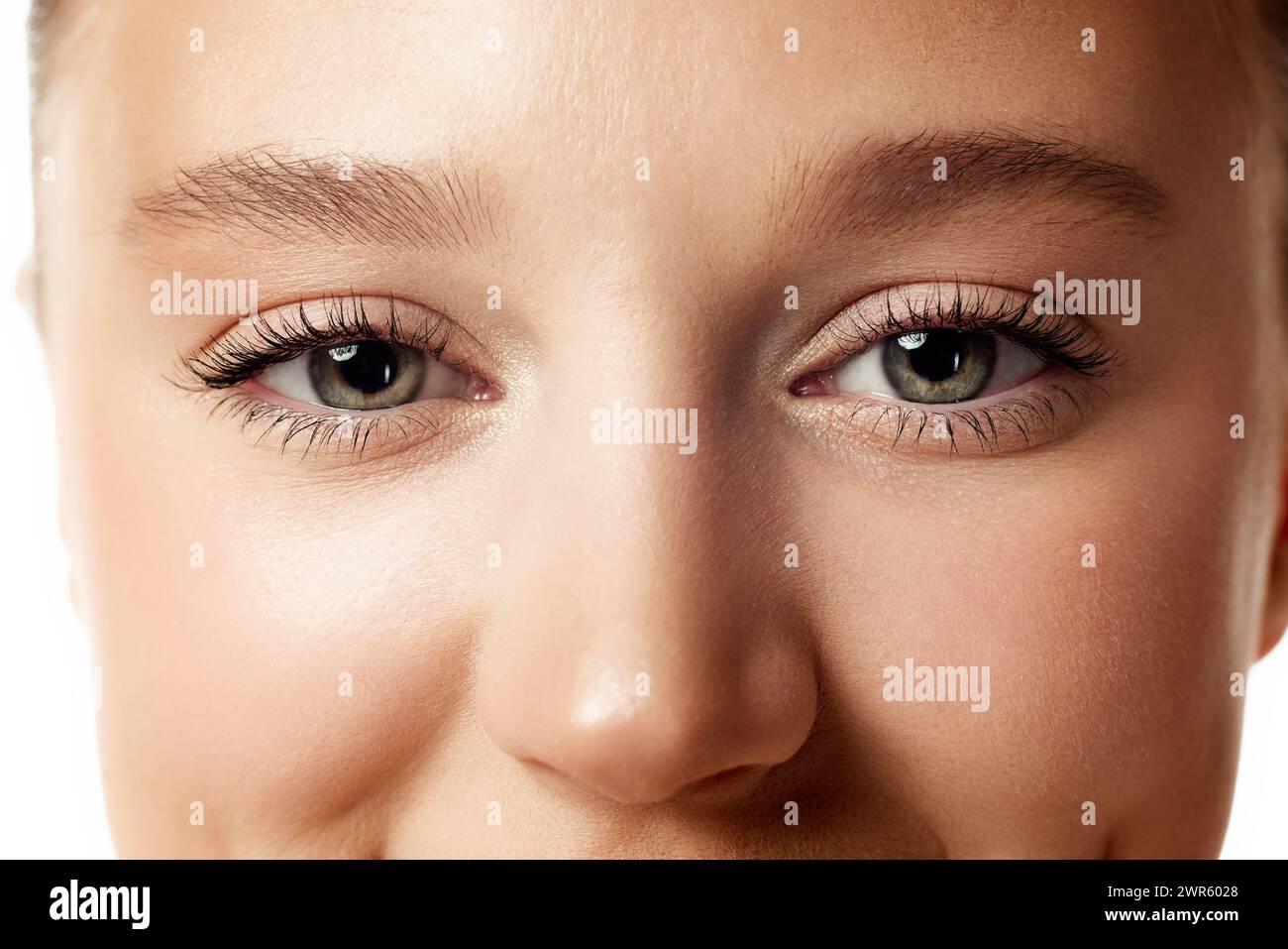 Closeup photo of young female face, body part, eyes and nose against ...