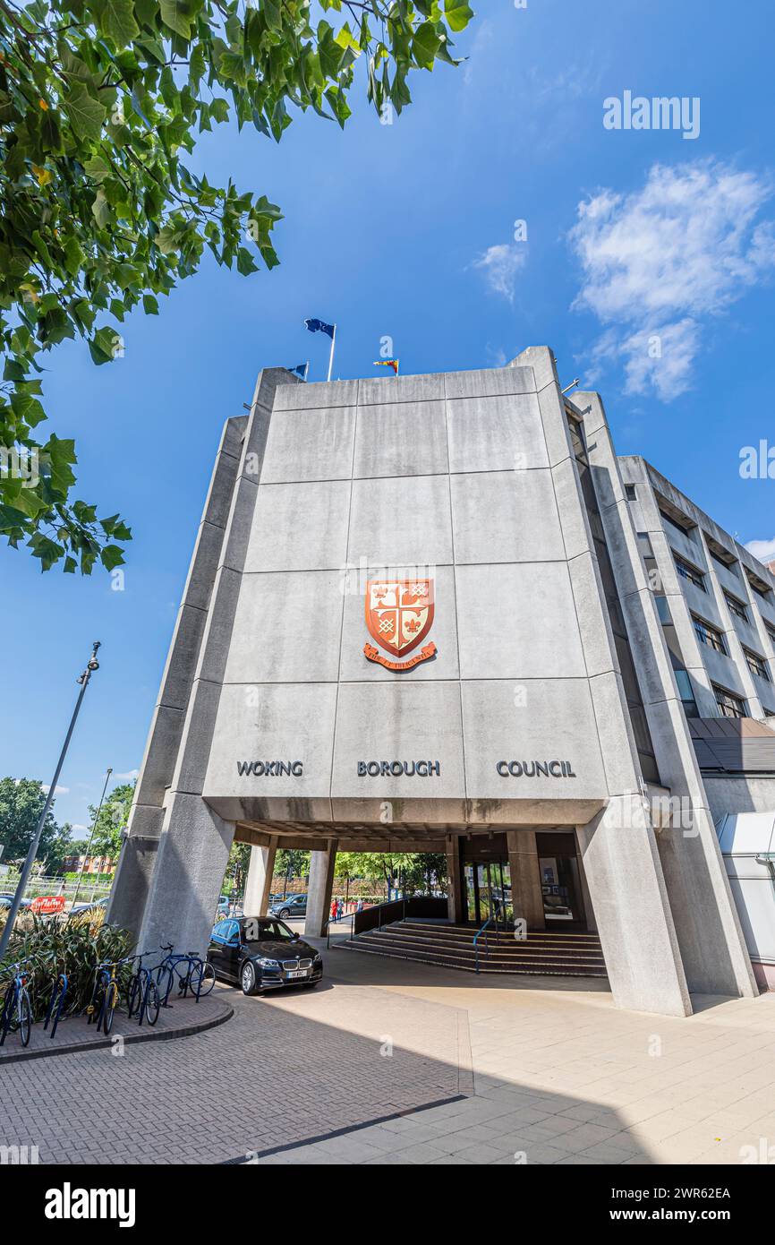 Modern civic offices with crest and mayoral car of bankrupt local ...