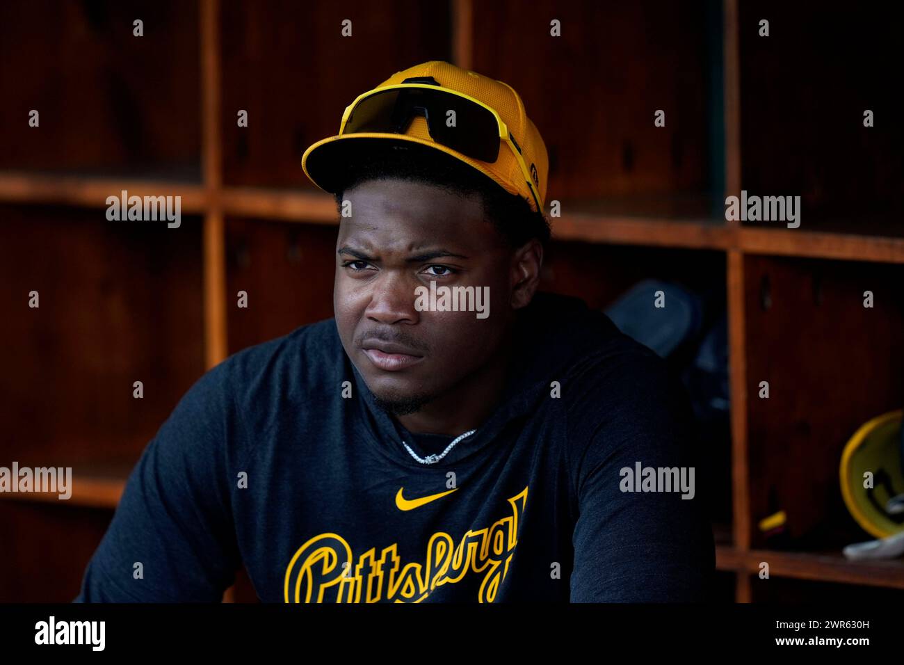 Pittsburgh Pirates second baseman Termarr Johnson sits in the dugout ...