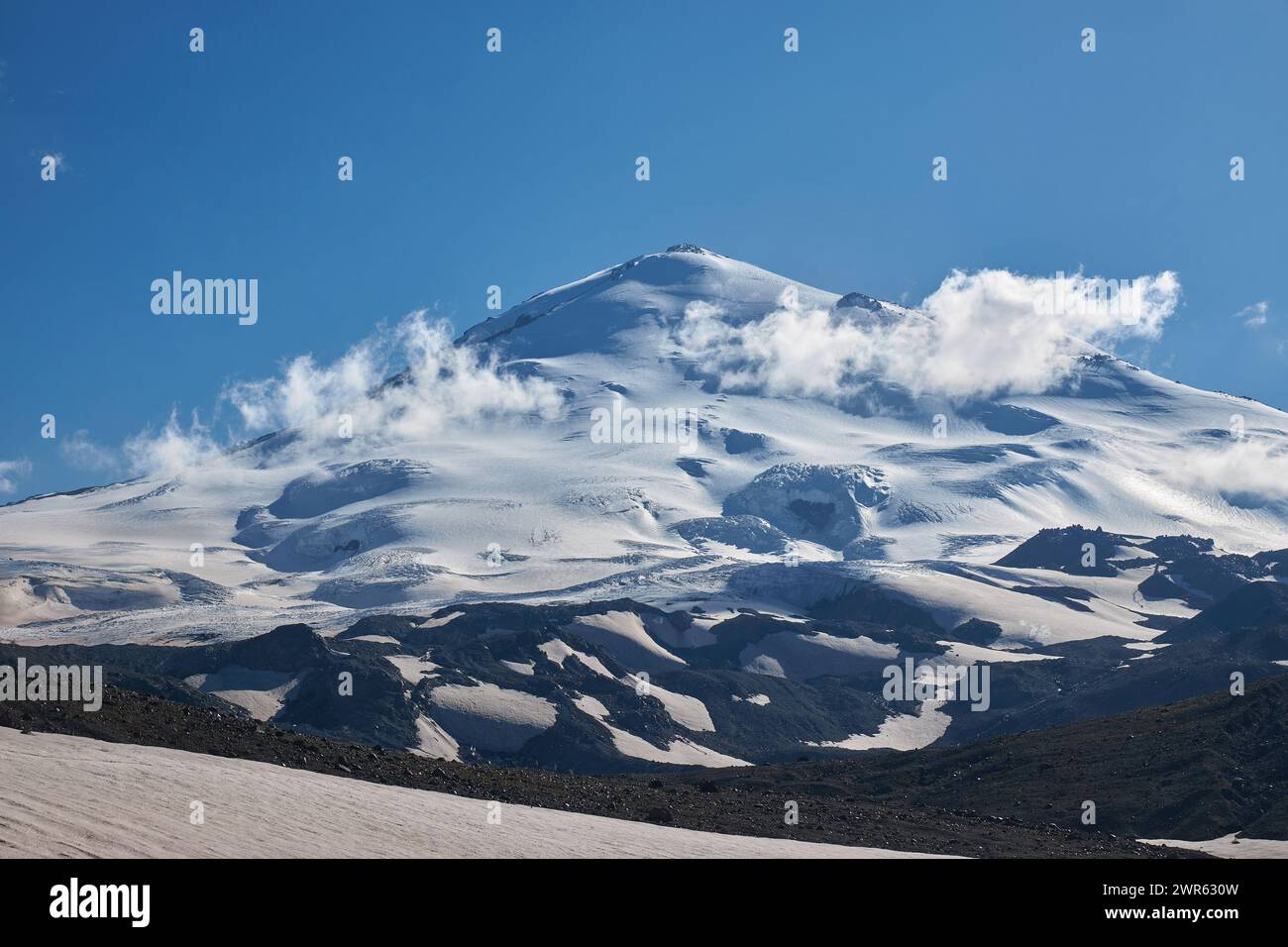 Russia Caucasus, Mount Elbrus towers majestically, adorned in pristine ...