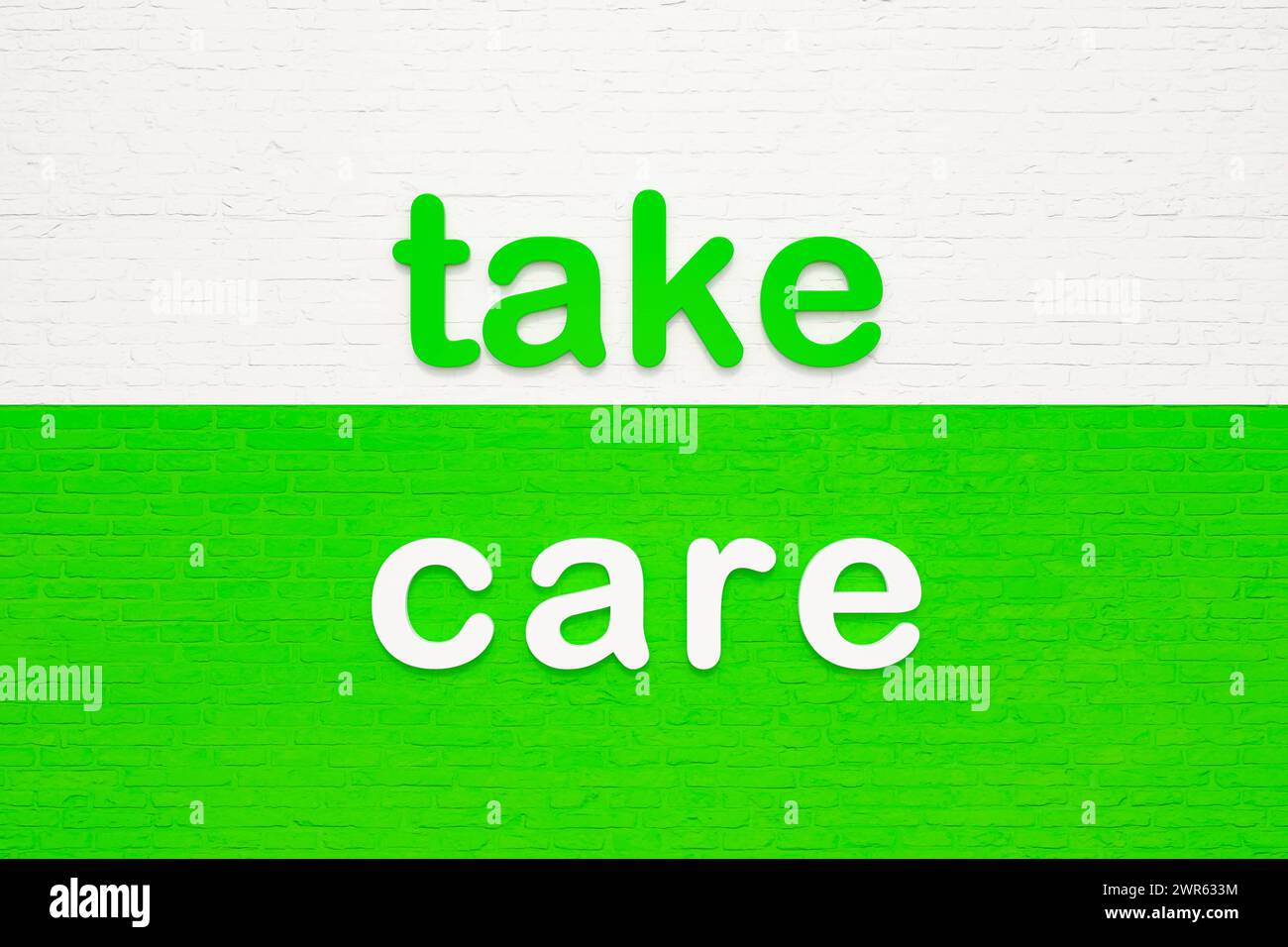 Take care. Take care. Colored letters against a white and green brick ...