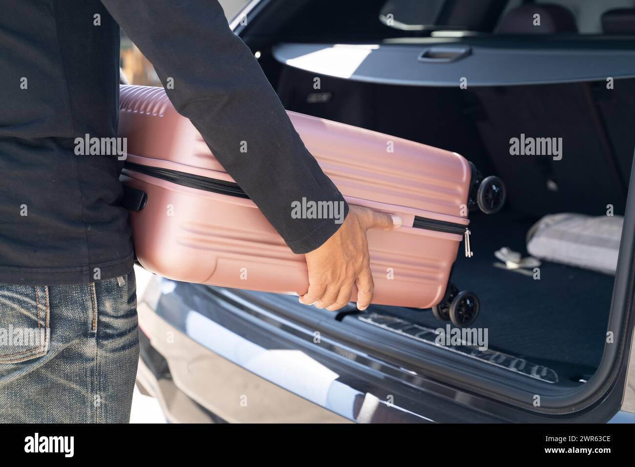 Loading bag trip vacation time Stock Photo - Alamy