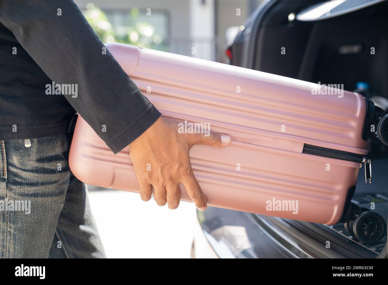 Loading bag trip vacation time Stock Photo - Alamy