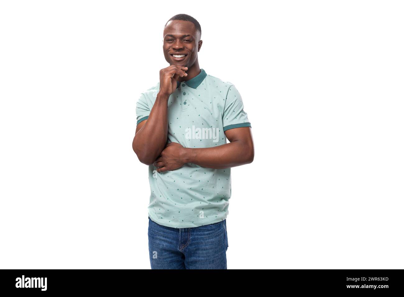 young handsome smiling african man dressed casually on studio ...