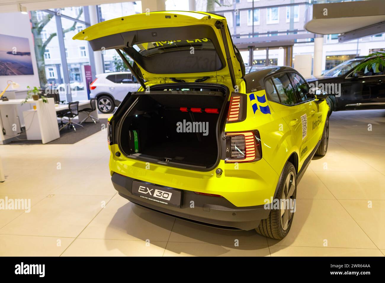 open car trunk lemon green Volvo EX30 electric SUV produced Swedish ...
