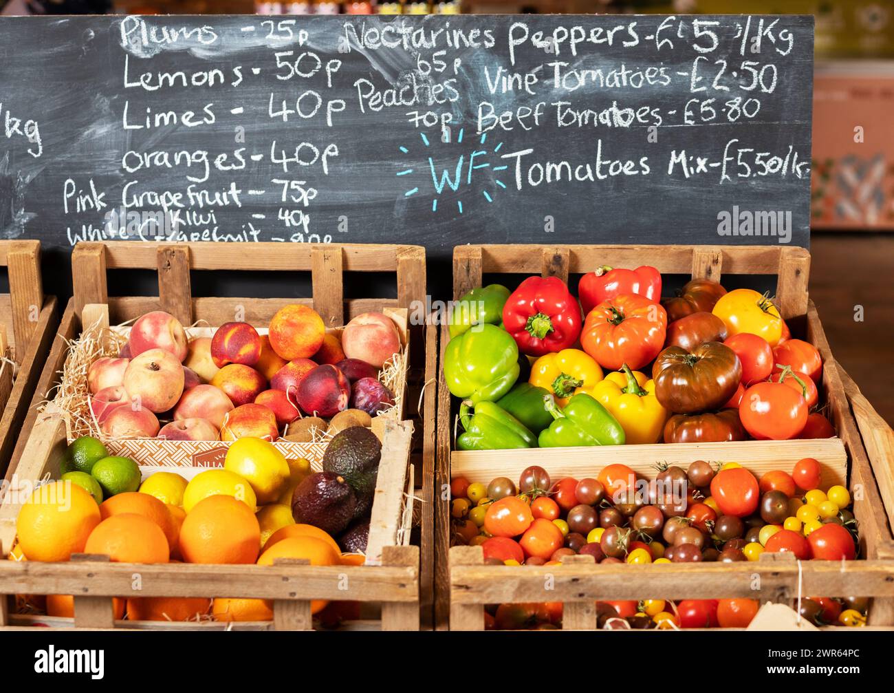 Fresh fruit and vegetables on display in a shop Stock Photo - Alamy