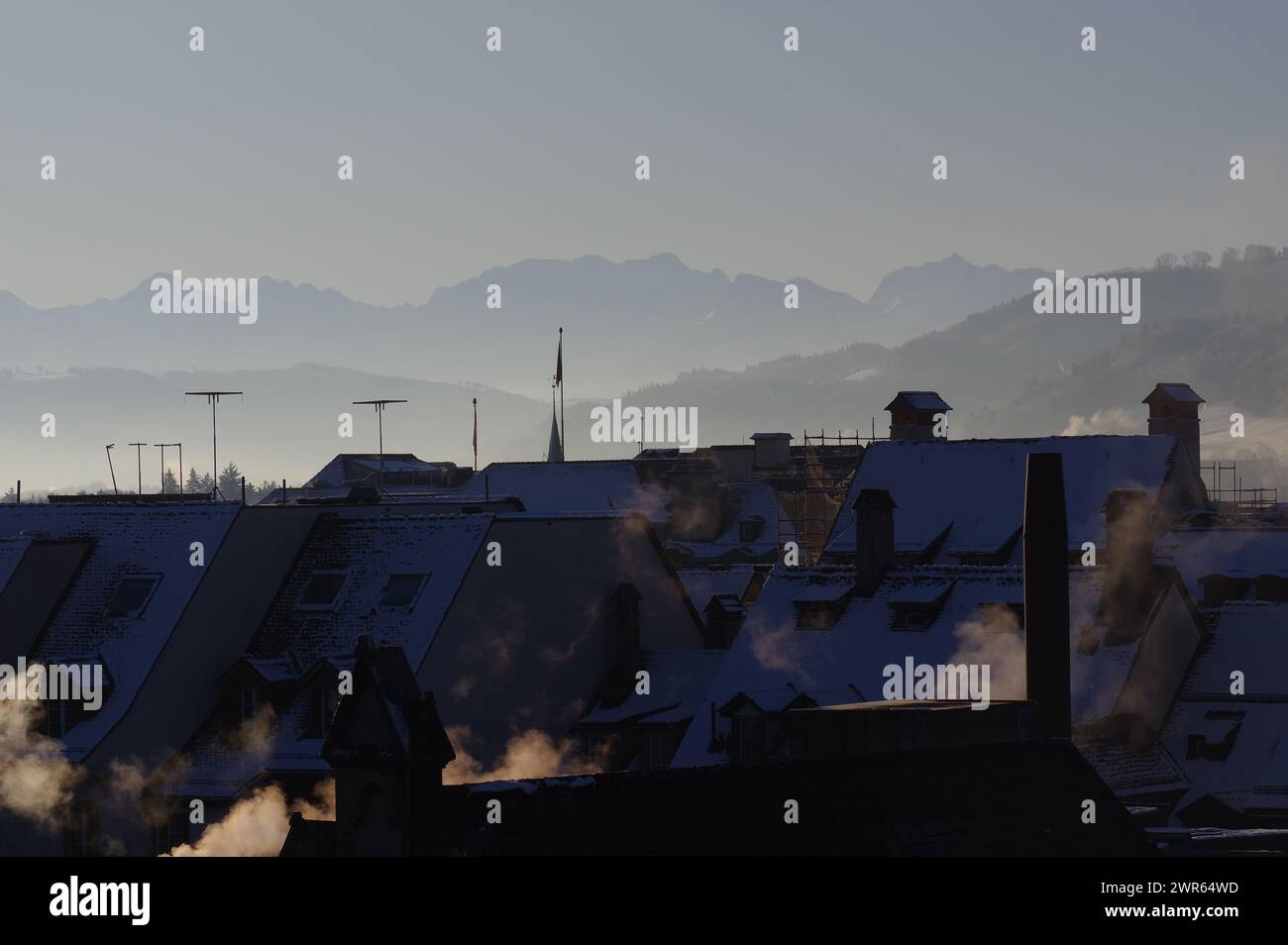 Heating Fumes emanating from Chimneys in Bern, Switzerland Stock Photo ...