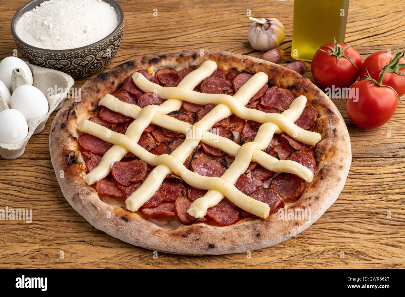 Calabrian sausage and Catupiry cream cheese style pizza over stone ...