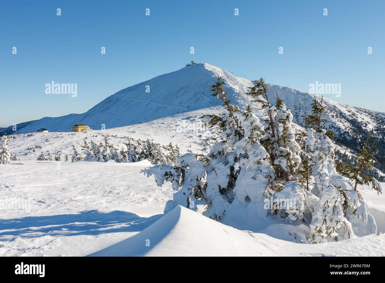 Winter morning, Silesian house, located at the foot of Snezka, krkonose ...