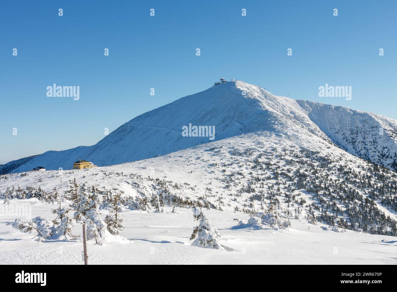 Winter morning, Silesian house, located at the foot of Snezka, krkonose ...