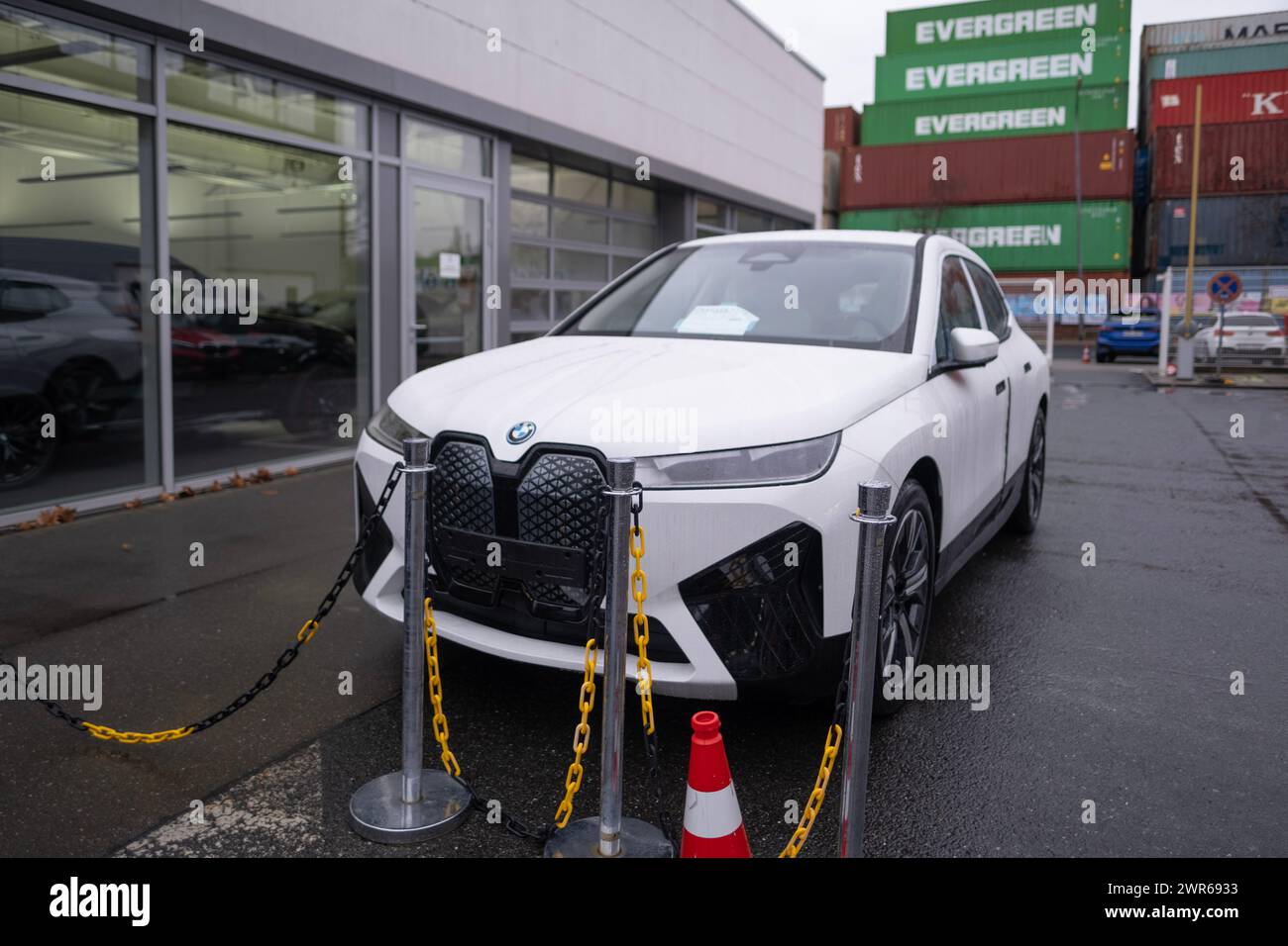white BMW iX xDrive mid-size electric crossover car, German ...