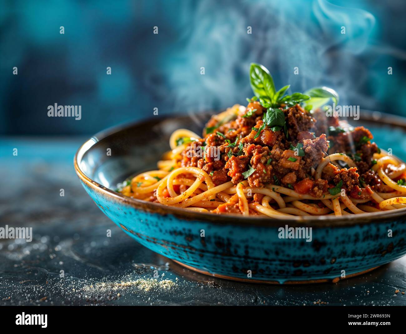 Spaghetti Bolognese in modern ceramic bowl on dark slate table Stock ...