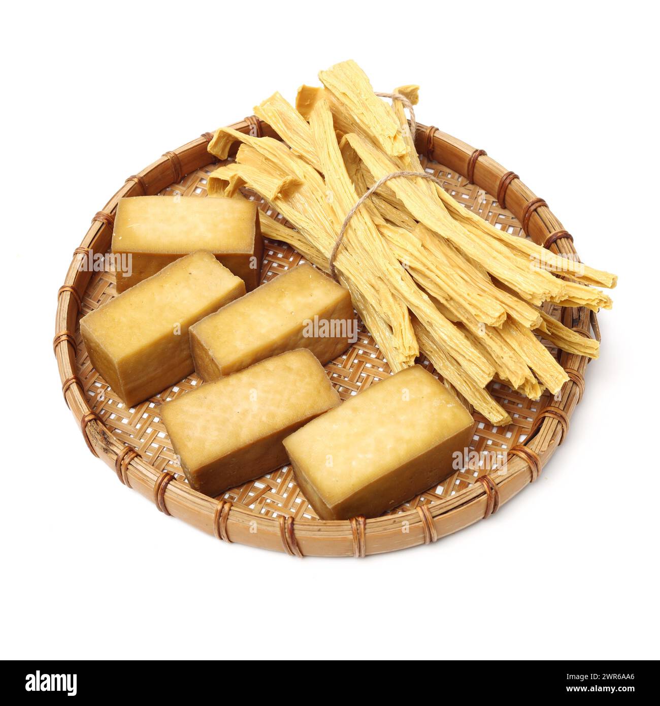Dried bean curd on white background Stock Photo - Alamy