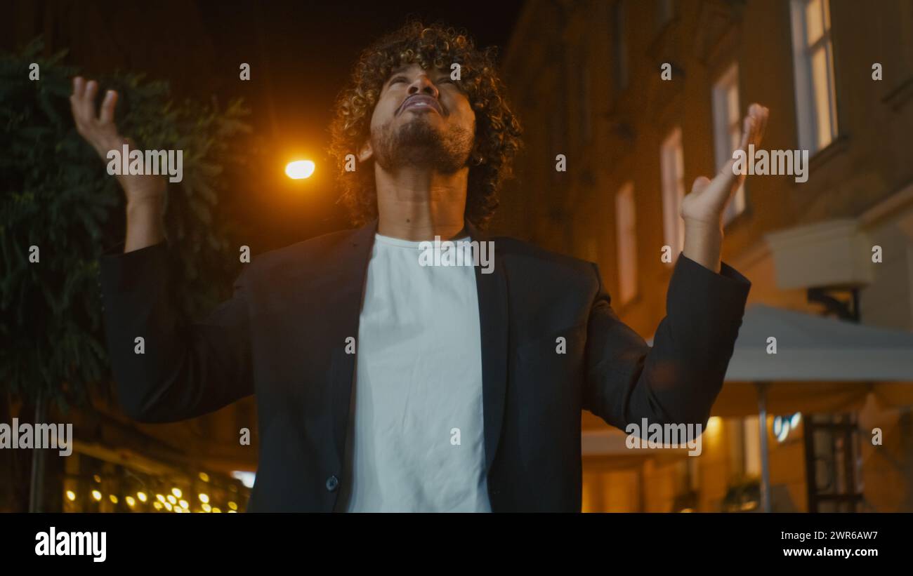 Upset Arabian Latino Indian American man outside city dissatisfied ...