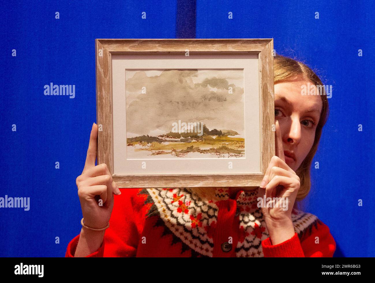 London, England, UK. 11th Mar, 2024. Member of staff poses with ...