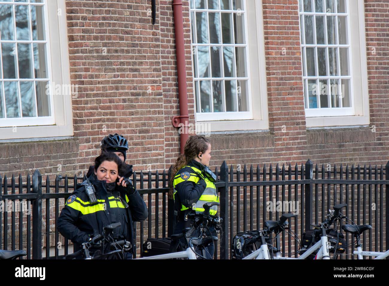Group Of Police Women On Bikes At Amsterdam The Netherlands 25-2-2023 ...