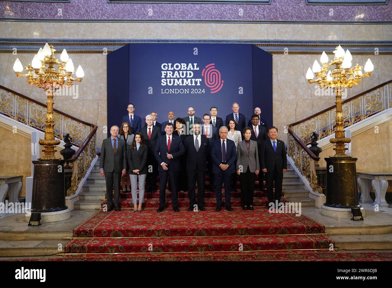 Home Secretary James Cleverly (centre) with delegates during the Global ...