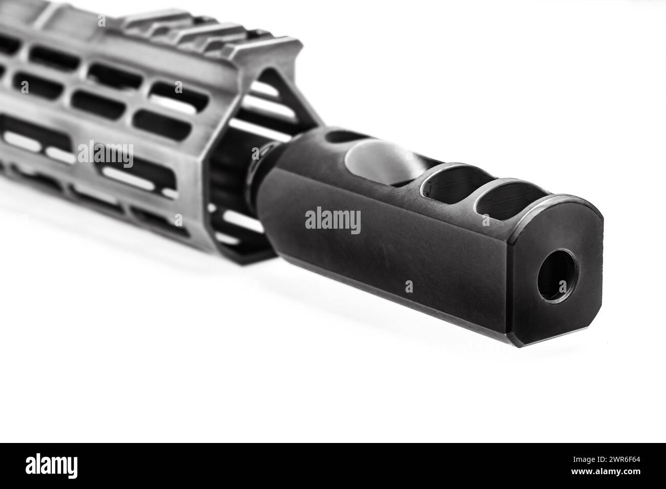 Assault rifle with flame arrester flash suppressor detail closeup ...