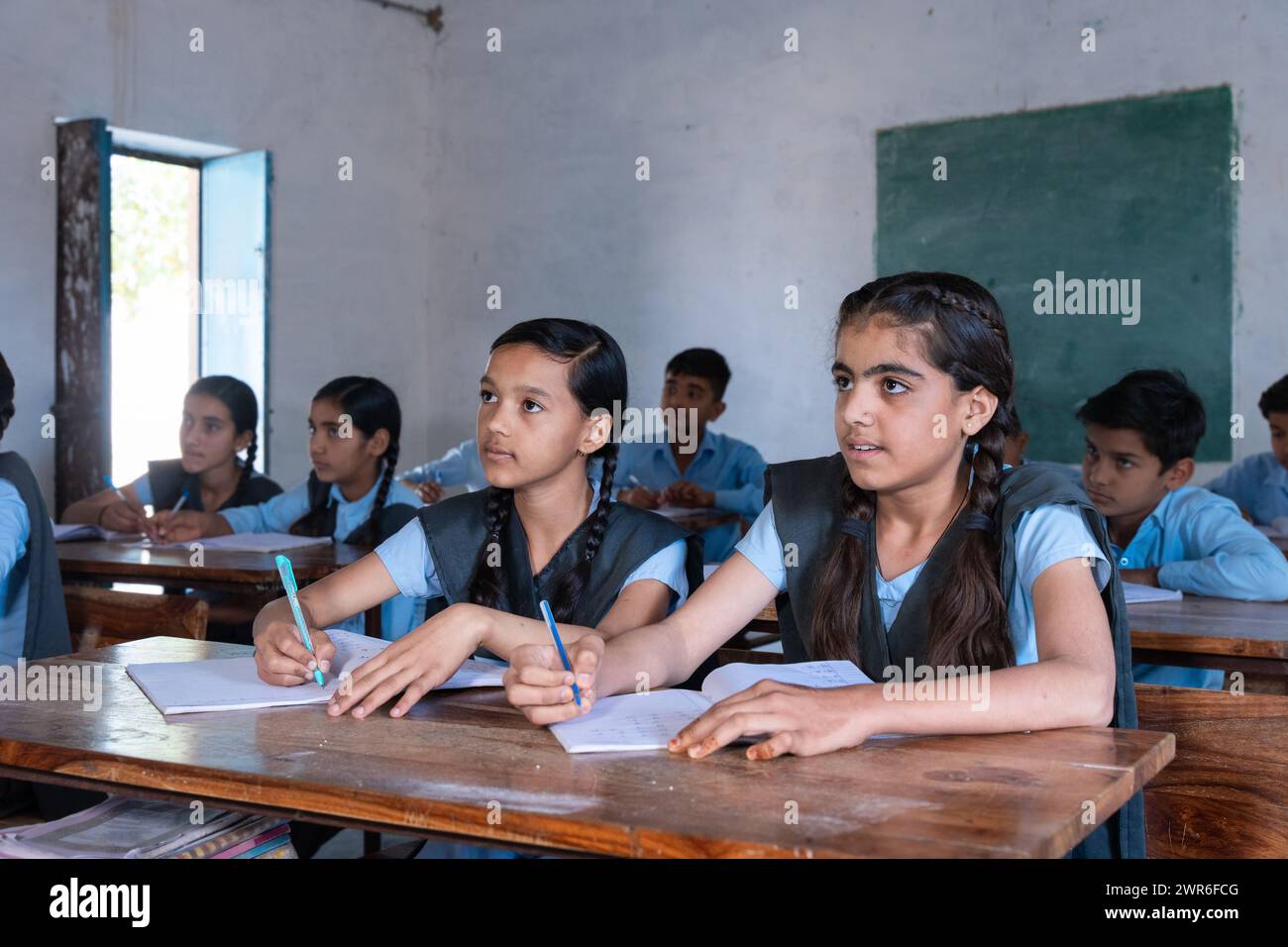 Indian rural kids and female teacher classroom hi-res stock photography ...