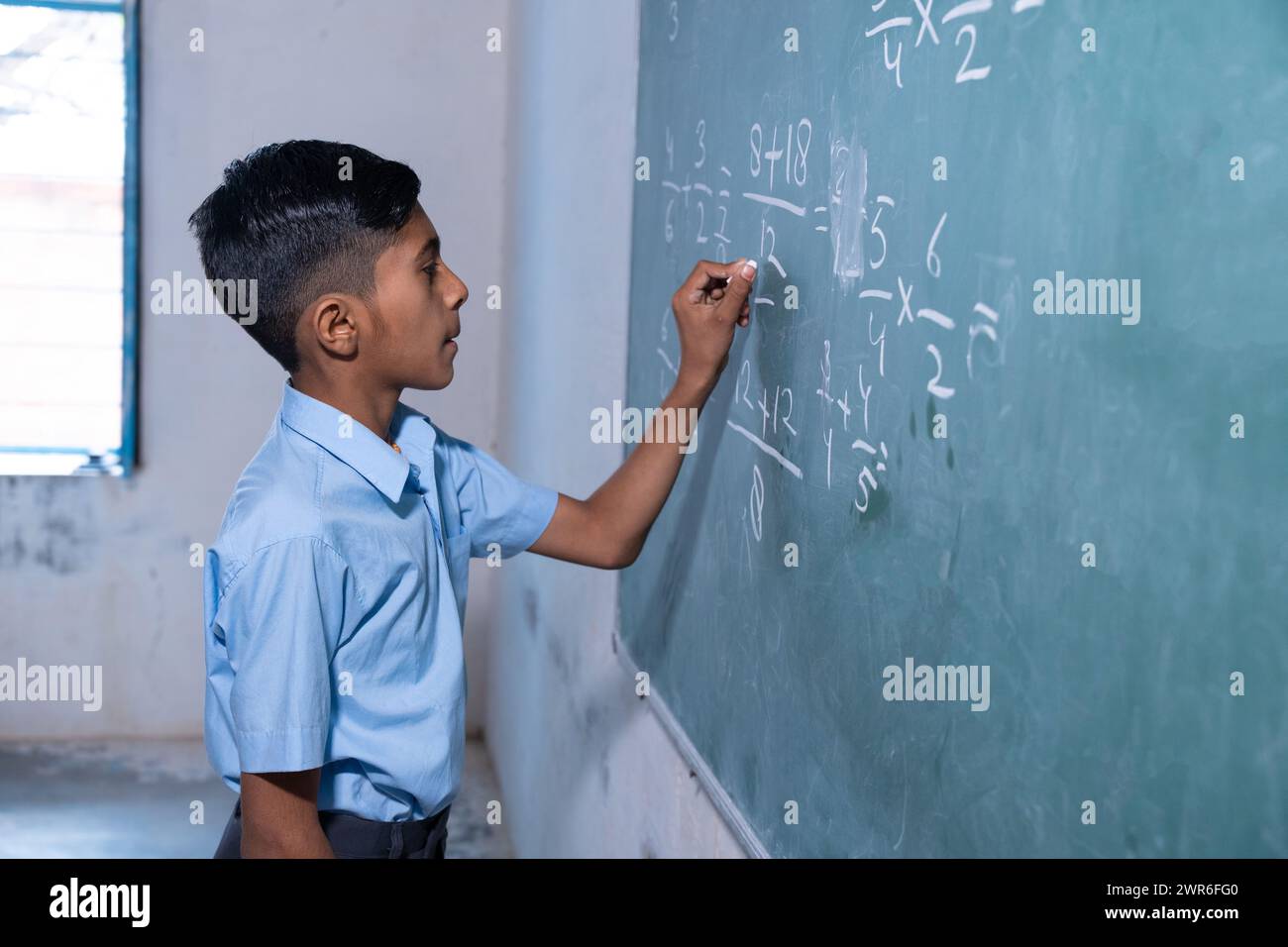 Indian school boy in classroom hi-res stock photography and images - Alamy
